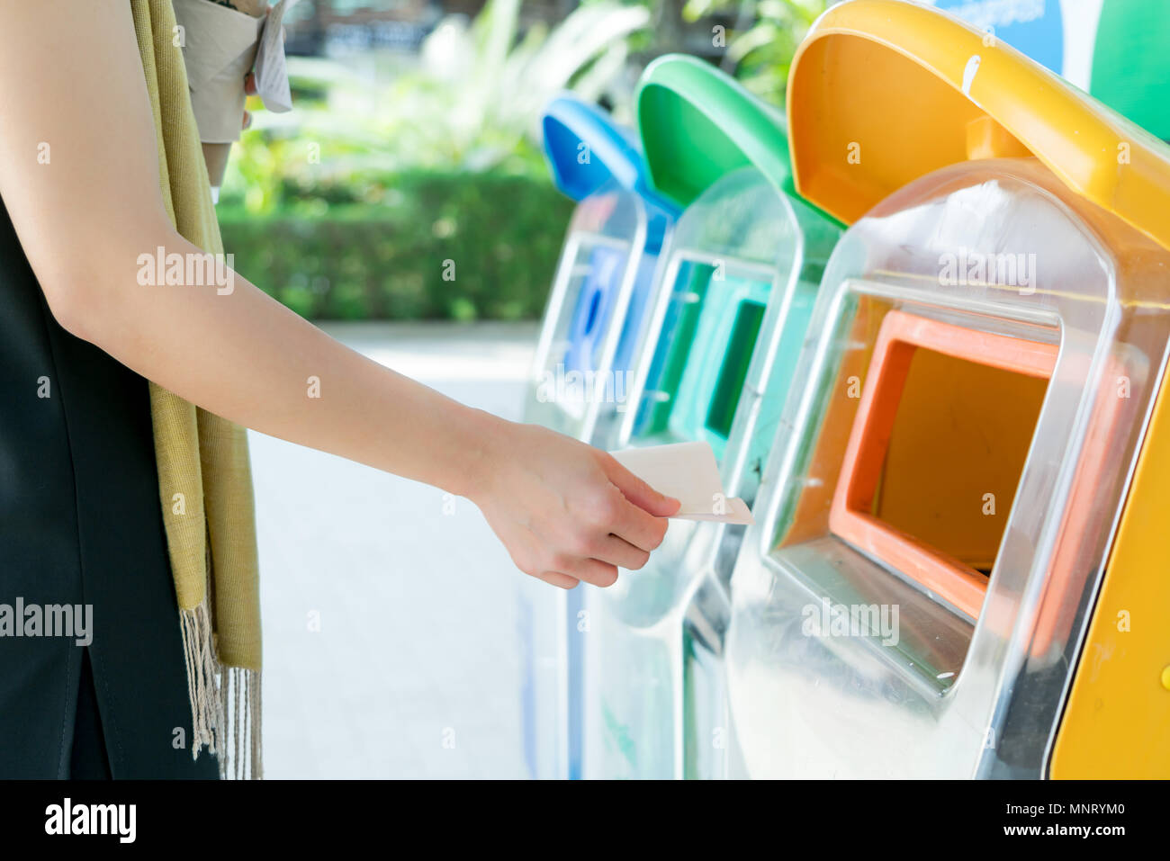 women hand throwing away the garbage to the bin/trash, sorting waste ...