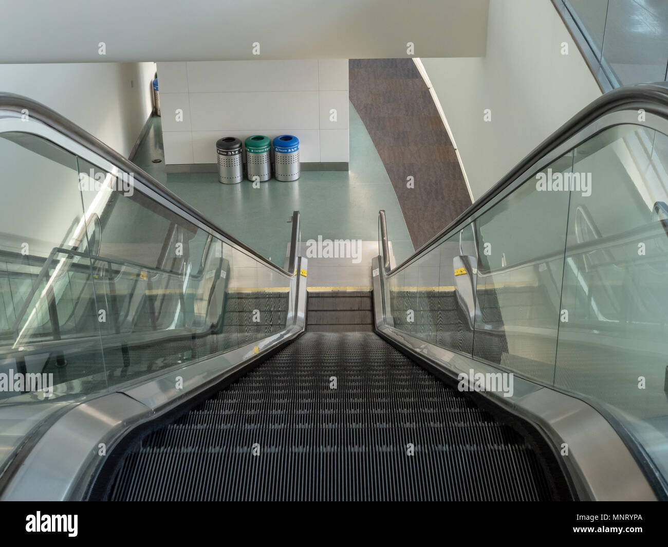 Escalator going downward direction in an empty airport terminal Stock ...