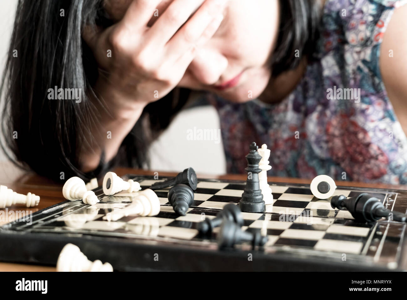 the loser women sad after fighting the chess, committed, competition ...