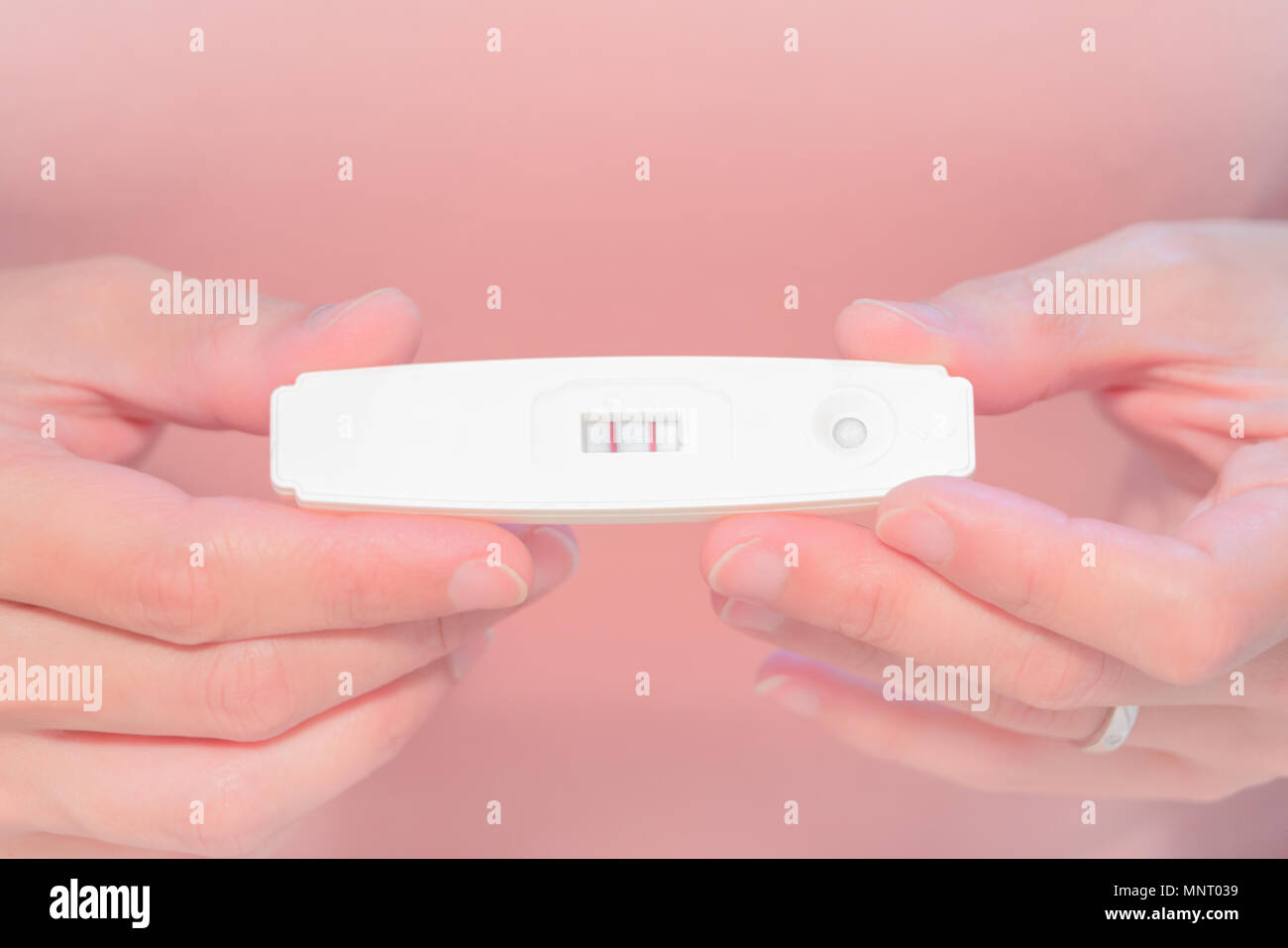 Test hcg positive hi-res stock photography and images - Alamy