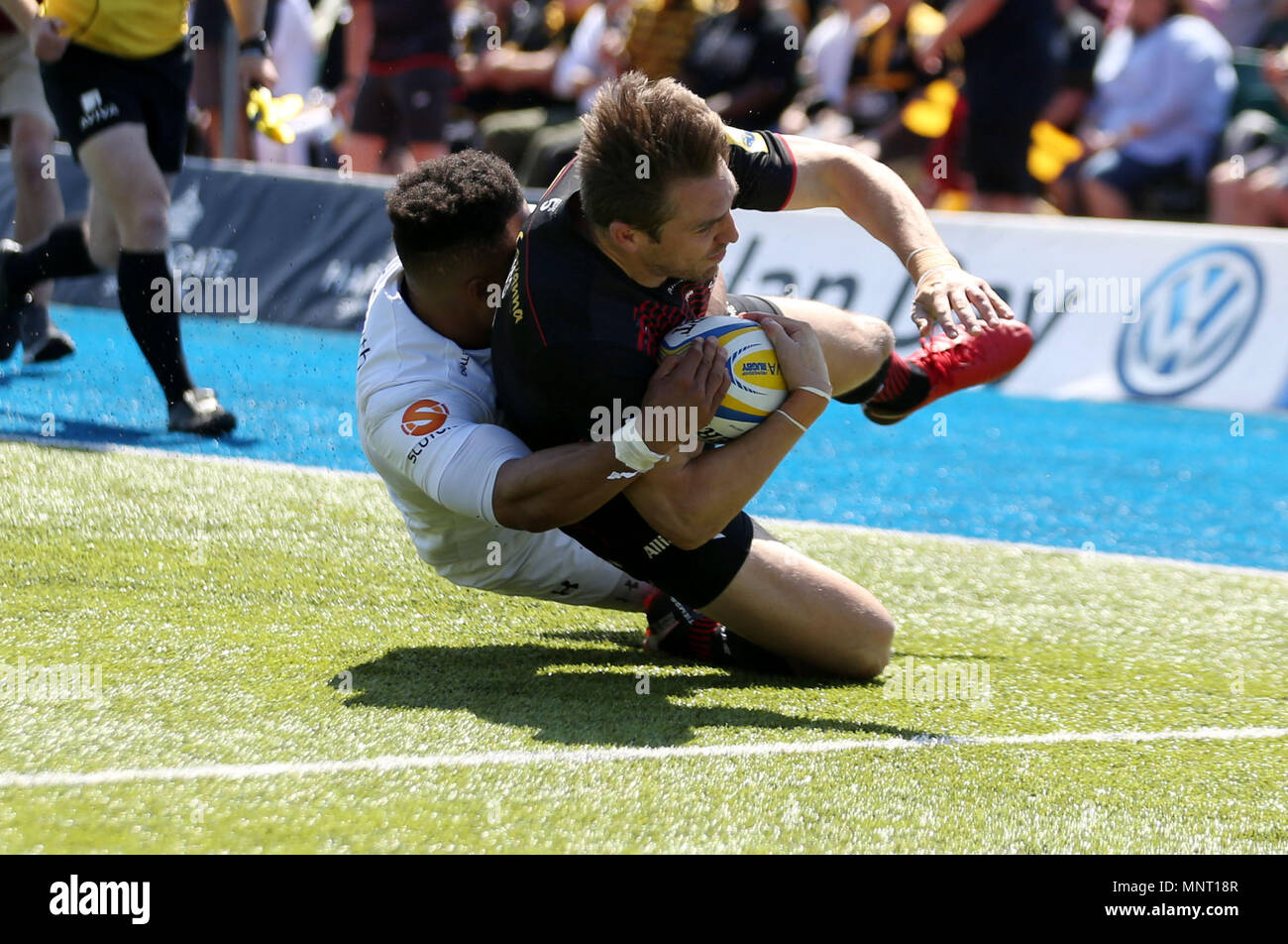 Saracens' Chris Wyles (right) scores their third try during the Aviva ...