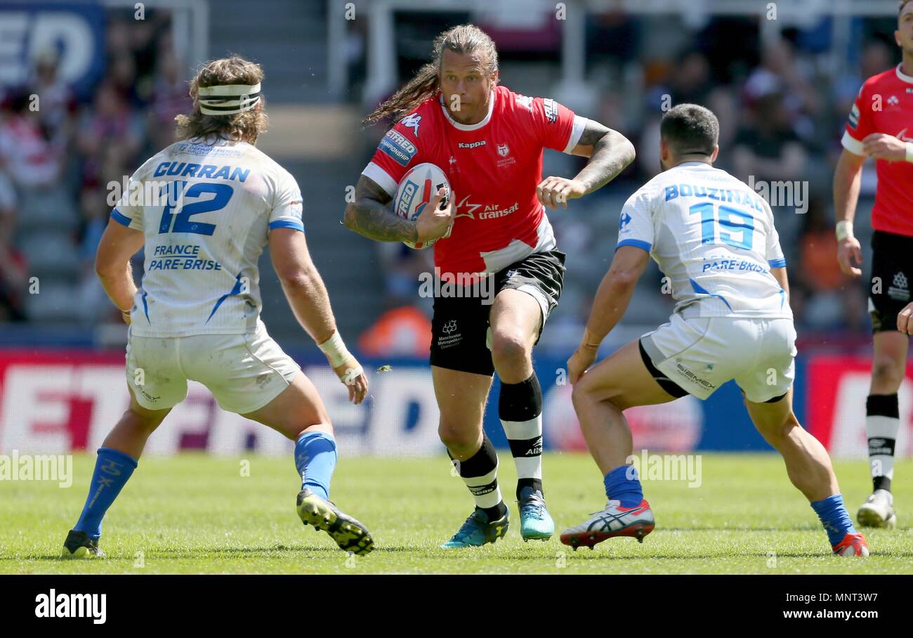 Toronto Wolfpack's Ashton Sims powers into the Toulouse defence during ...
