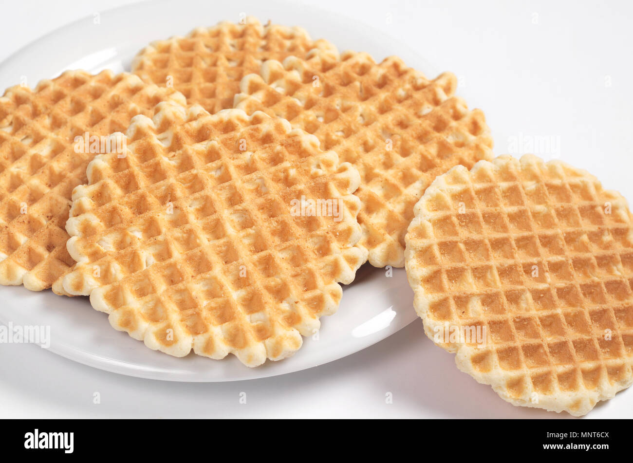 Homemade waffles in plate on white background close up Stock Photo - Alamy