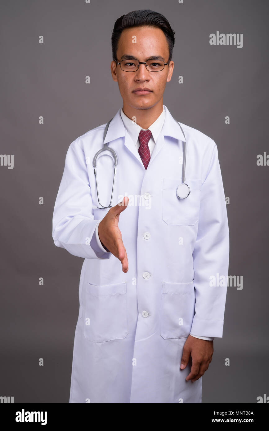 Successful asian indian medical doctor hi-res stock photography and ...