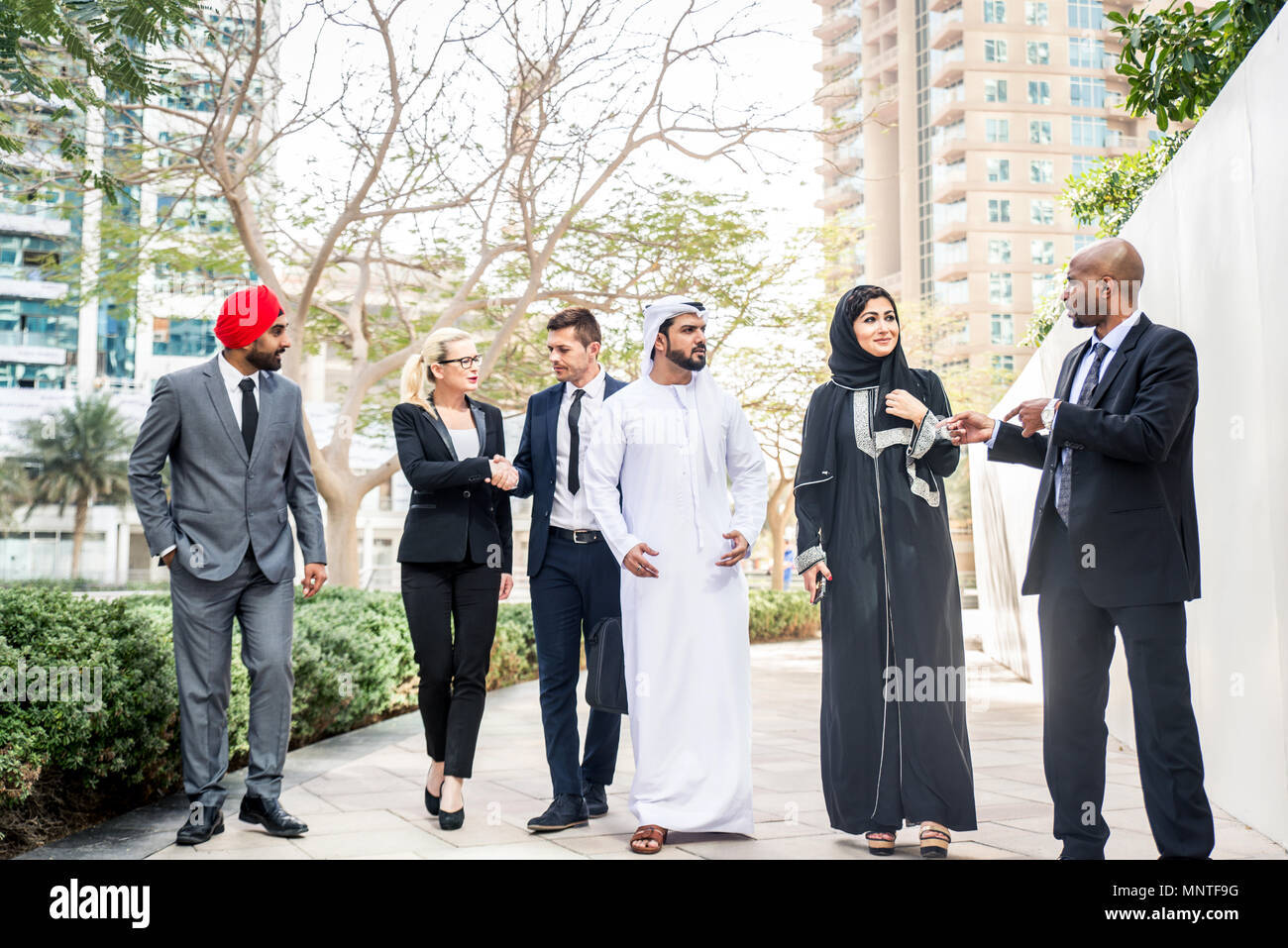 Multicultural business people meeting and talking about business ...