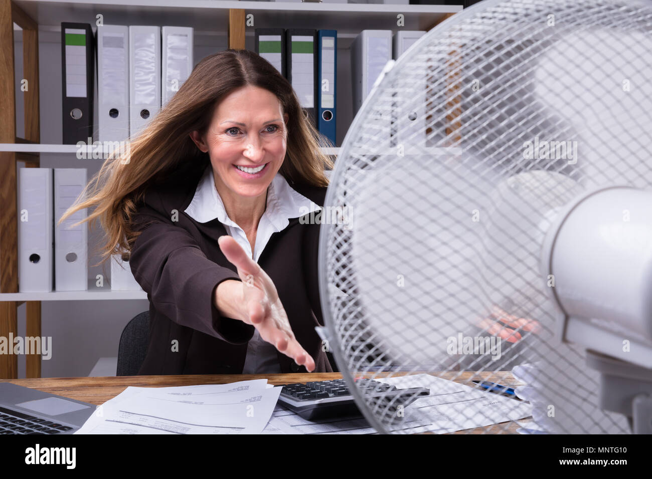 Old people cooling fan hi-res stock photography and images - Alamy