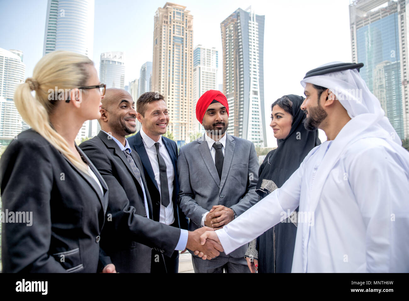 Multicultural business people meeting and talking about business ...