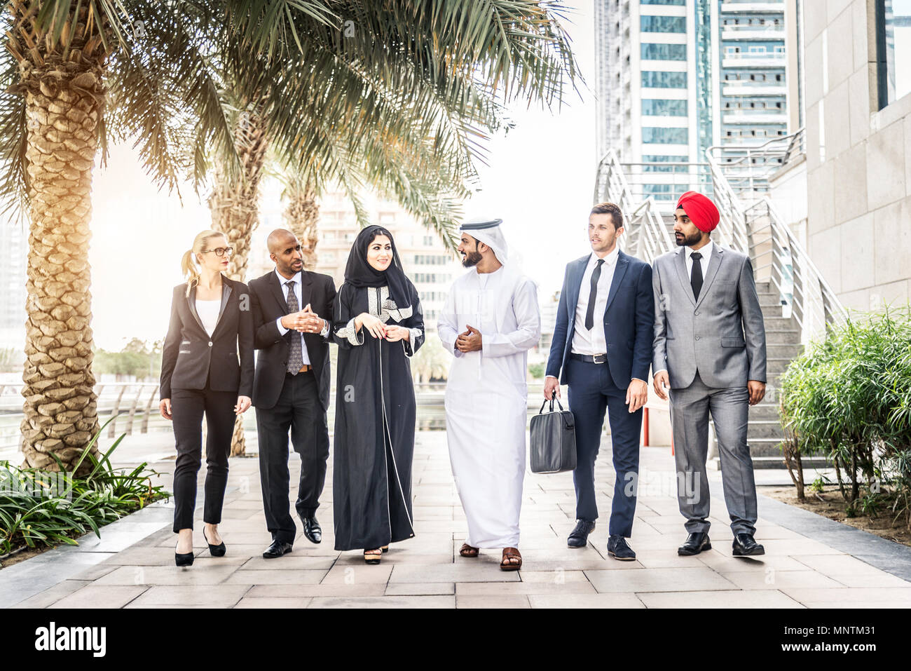 Multicultural business people meeting and talking about business ...