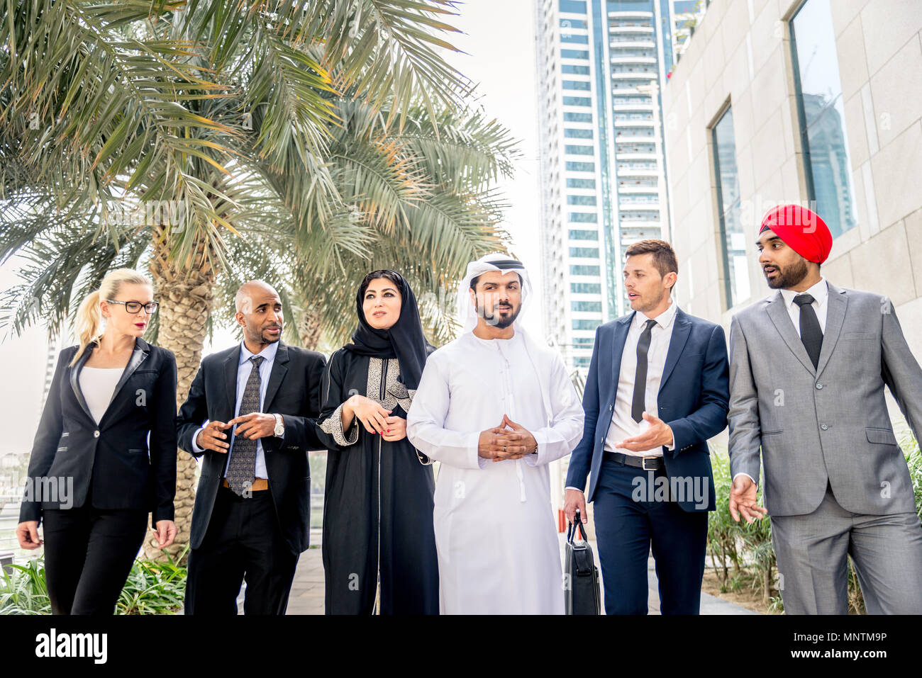 Multicultural business people meeting and talking about business ...