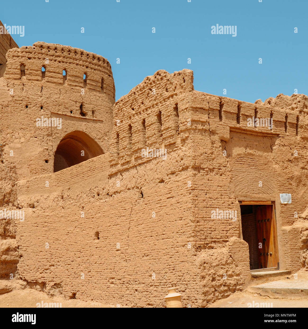Houses of abandoned mud brick village of Kharanaq in Iran Stock Photo ...