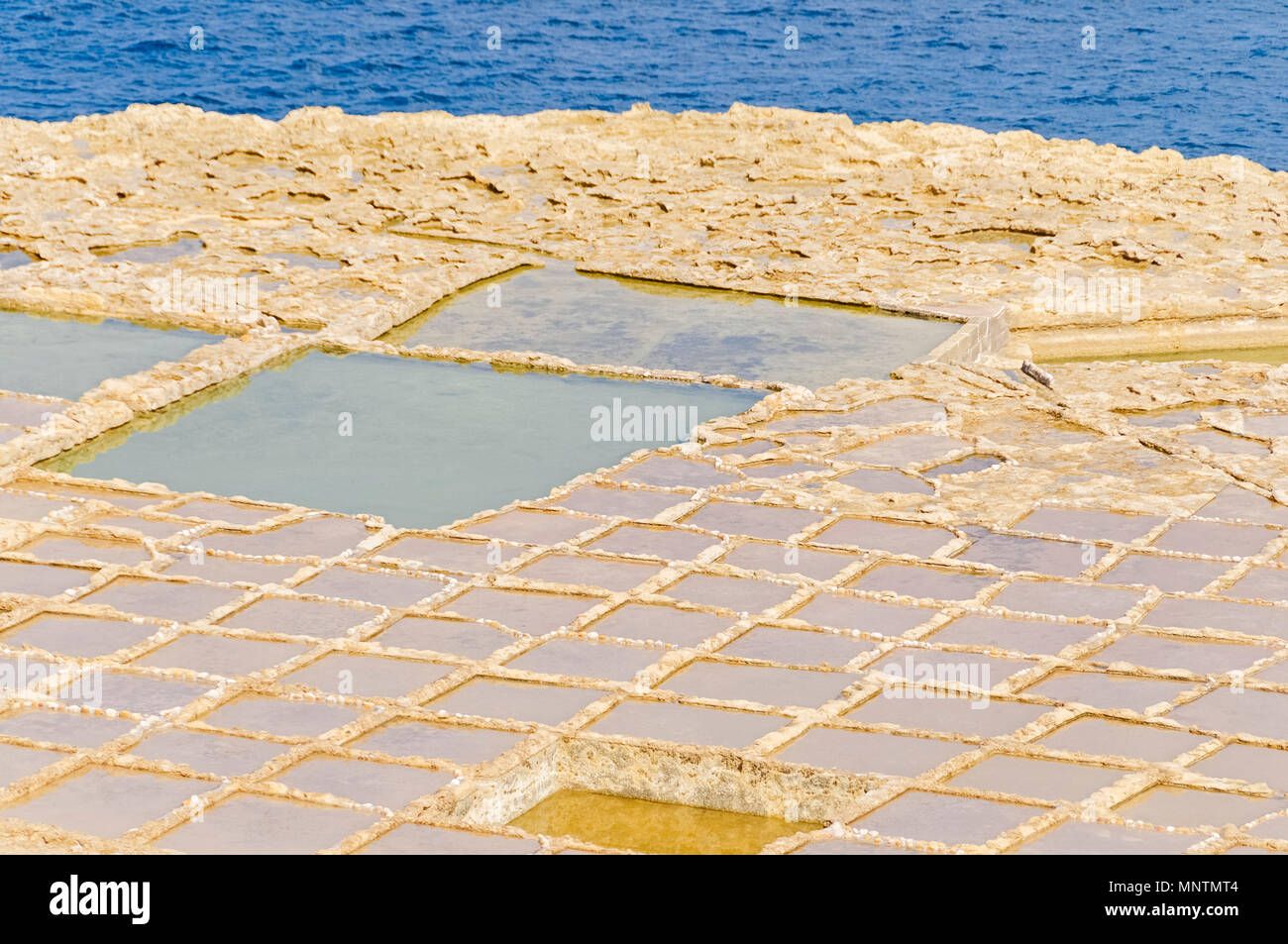 Gozo salt pans hi-res stock photography and images - Alamy