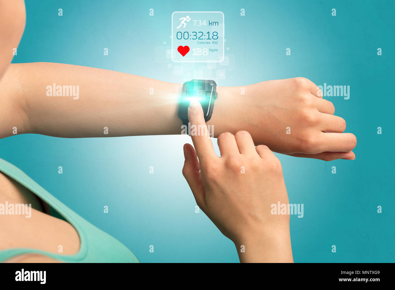 Female hand with smartwatch and running concept above Stock Photo - Alamy