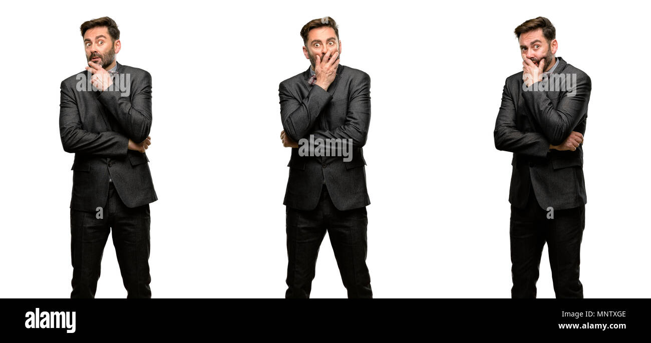 Middle age man, with beard and bow tie scared in shock, expressing ...