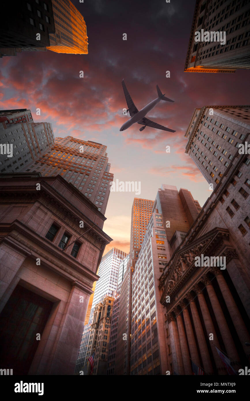the plane is flying over New York City Manhattan Skyline, U.S.A Stock ...