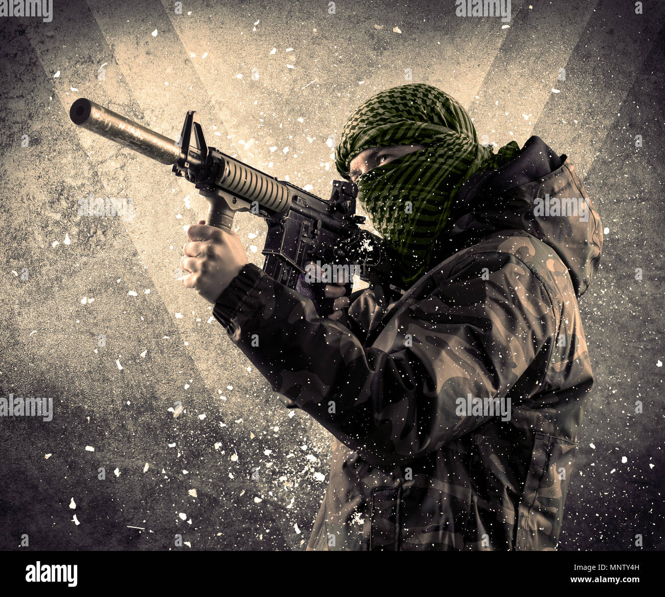 Portrait of a dangerous masked armed soldier with grungy light ...