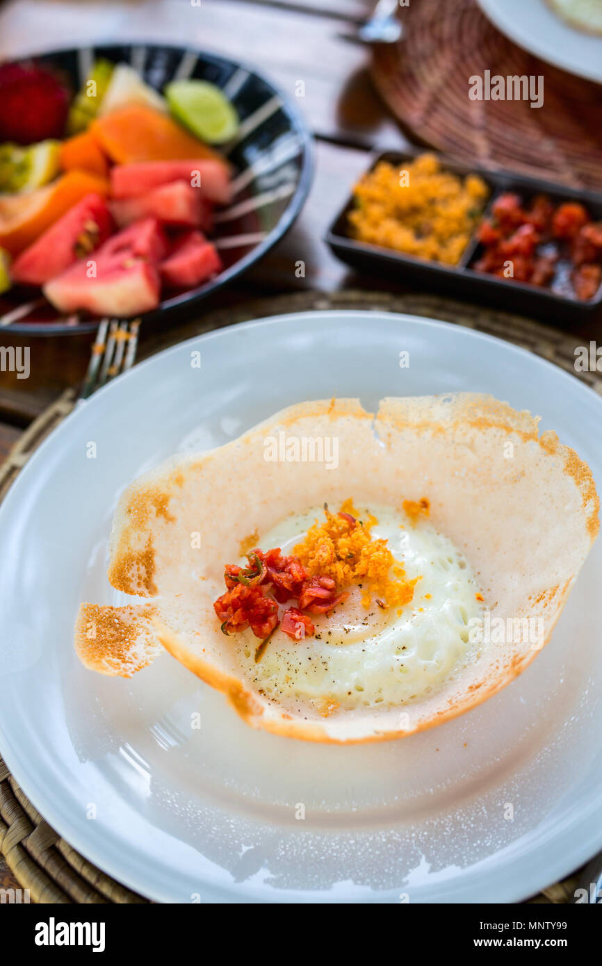 Traditional Sri Lankan breakfast with egg hoppers Stock Photo - Alamy