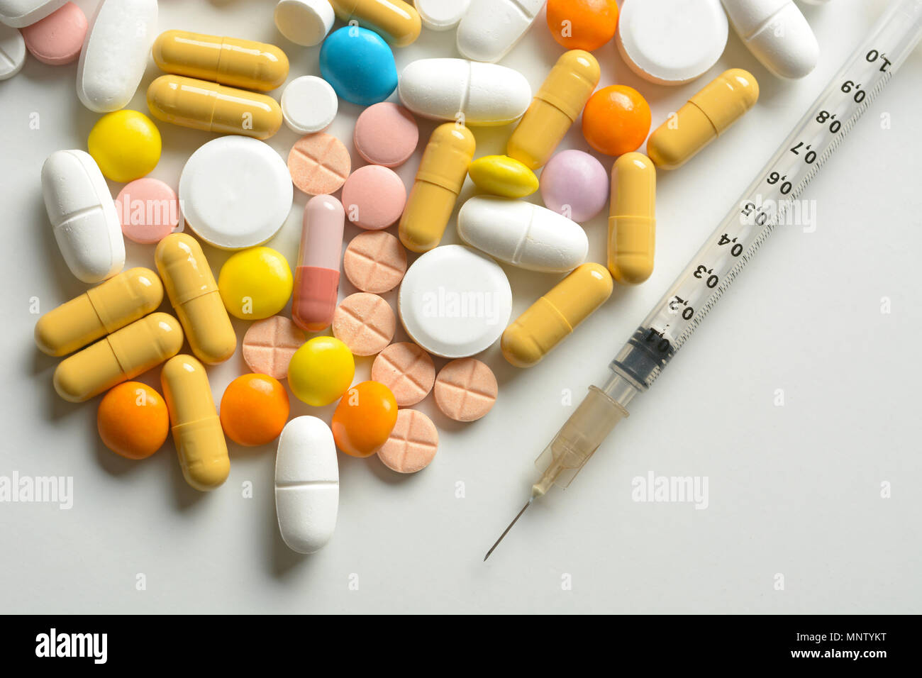 pile of generic drugs on white table - closeup Stock Photo - Alamy