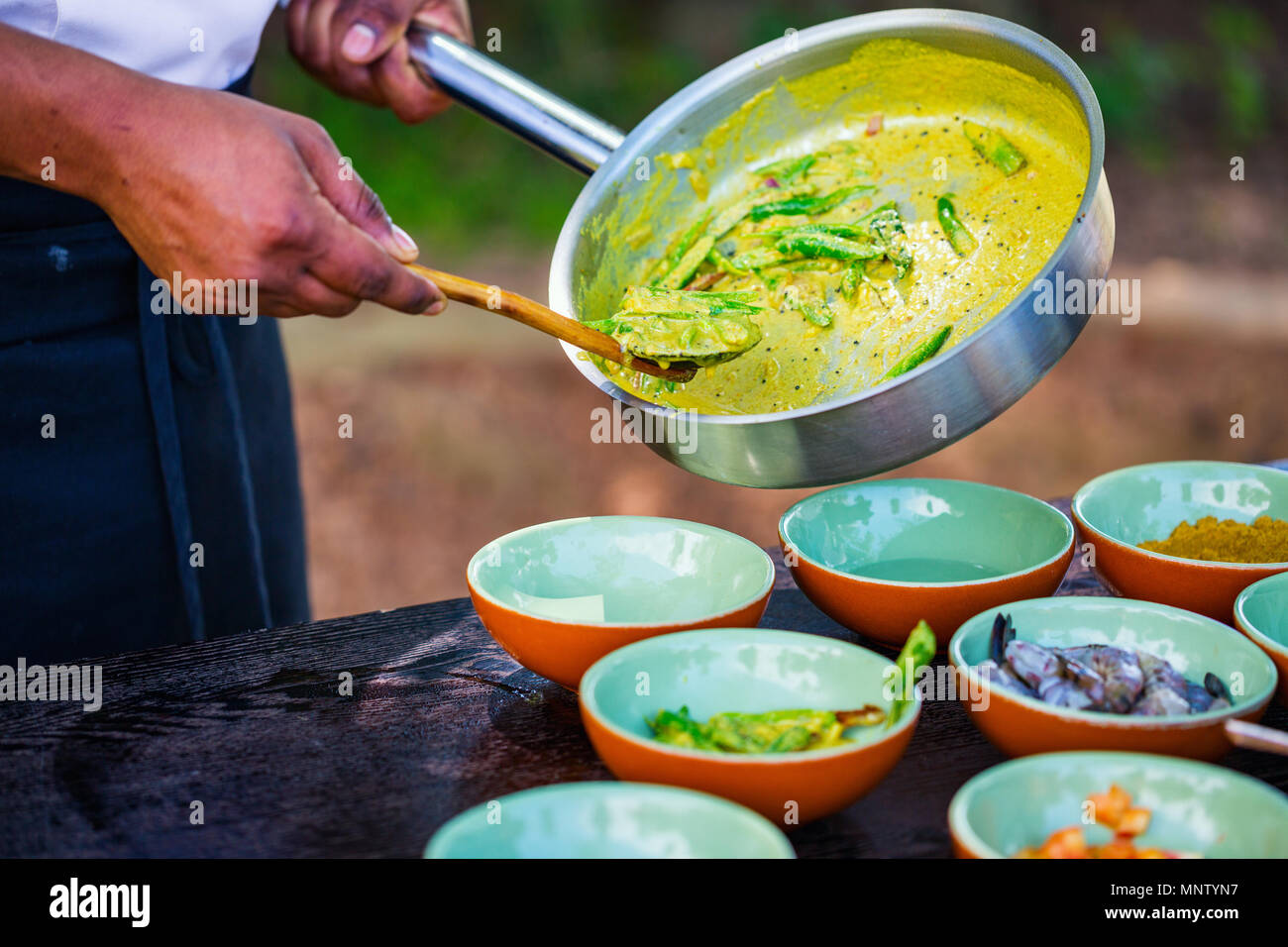 Chef making traditional Sri Lankan curry dish at cooking class Stock ...