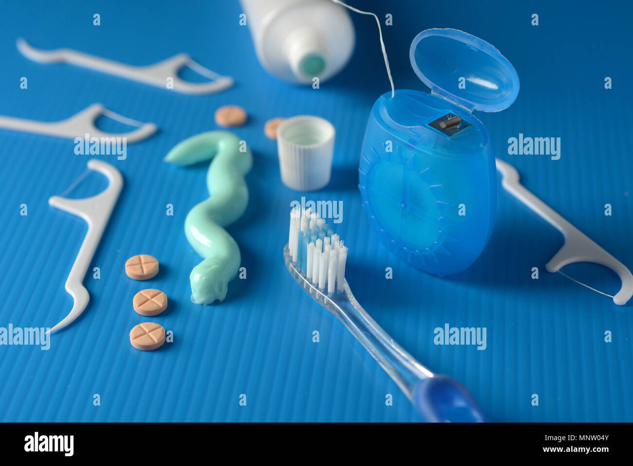 tools for oral hygiene on the light blue background - closeup Stock ...
