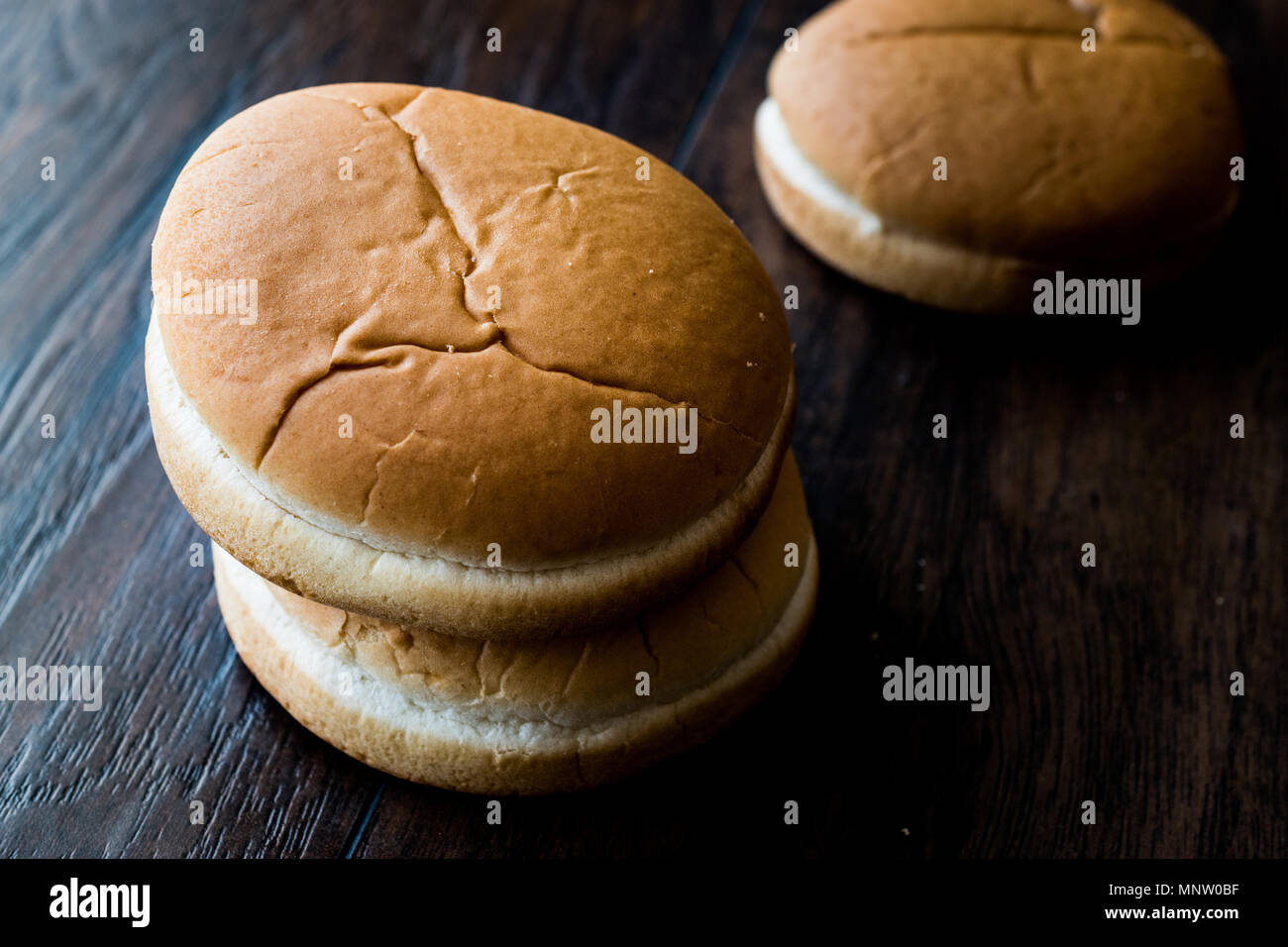 Stack of Hamburger Buns or Bread. Fast food concept Stock Photo - Alamy