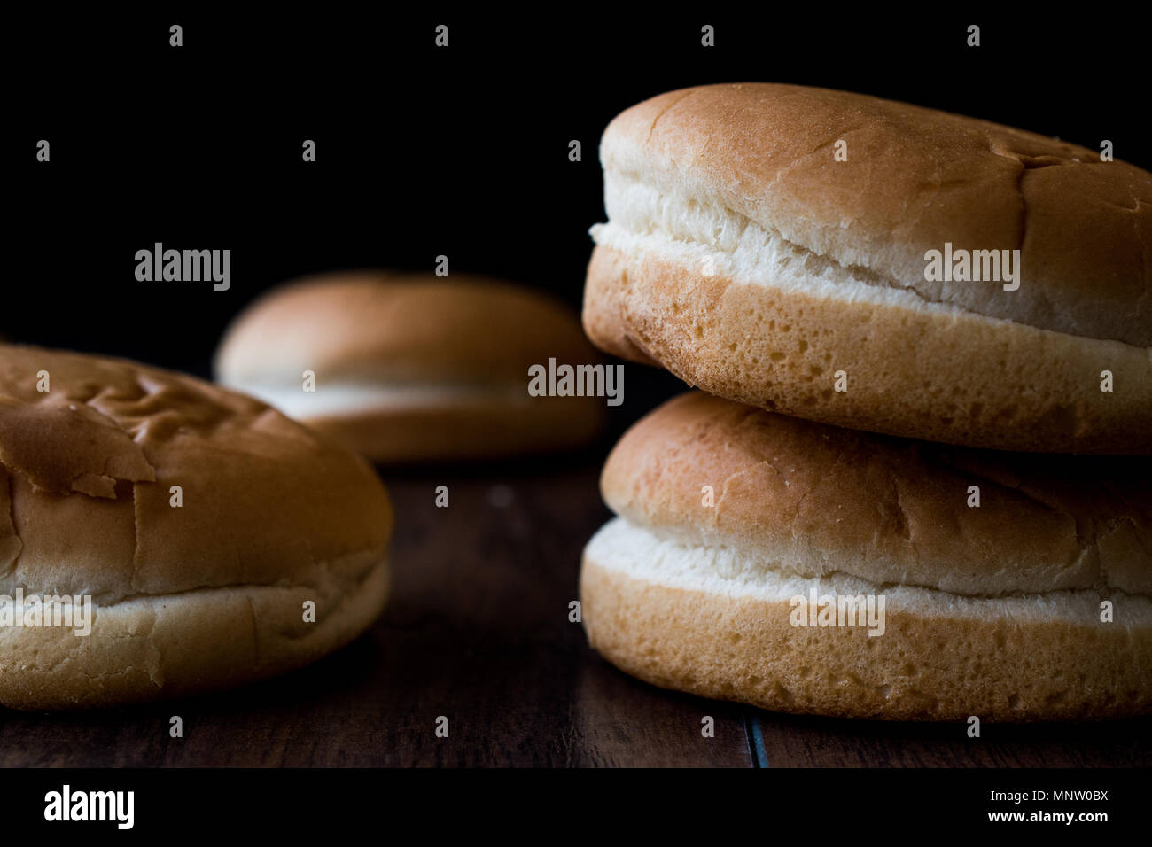 Stack of Hamburger Buns or Bread. Fast food concept Stock Photo - Alamy