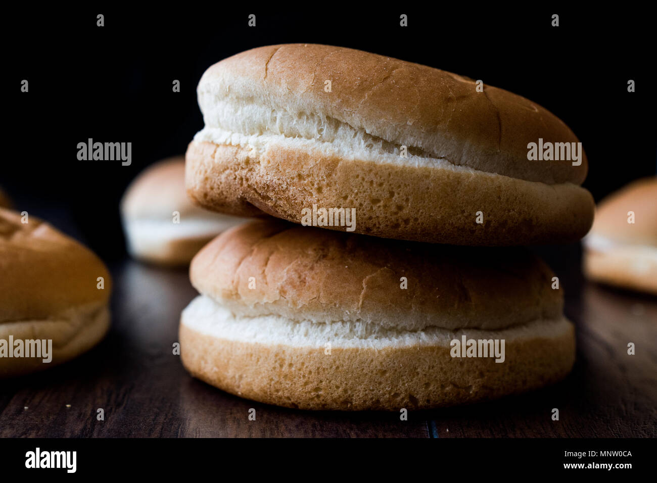 Stack of Hamburger Buns or Bread. Fast food concept Stock Photo - Alamy