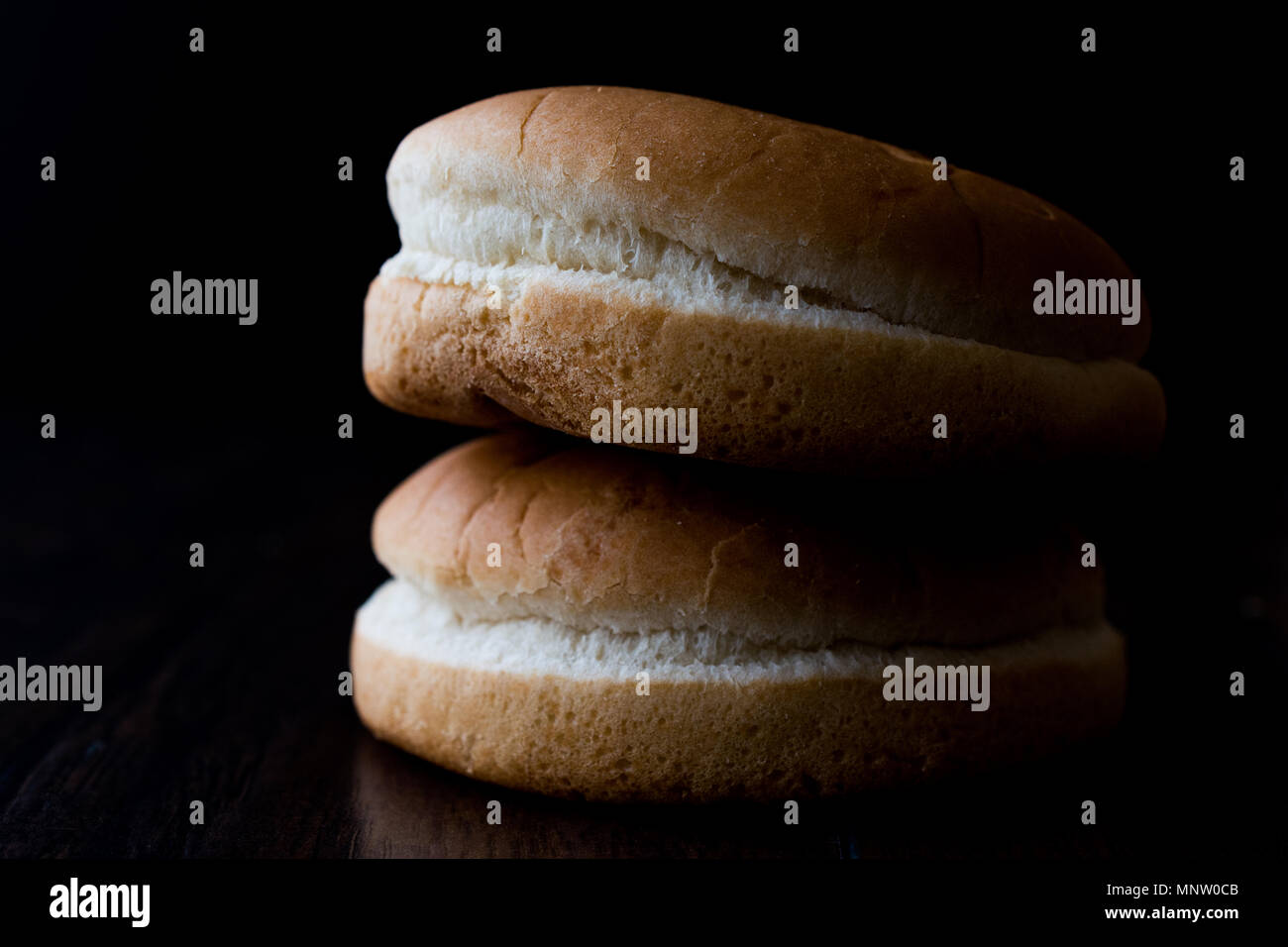 Stack of Hamburger Buns or Bread. Fast food concept Stock Photo - Alamy