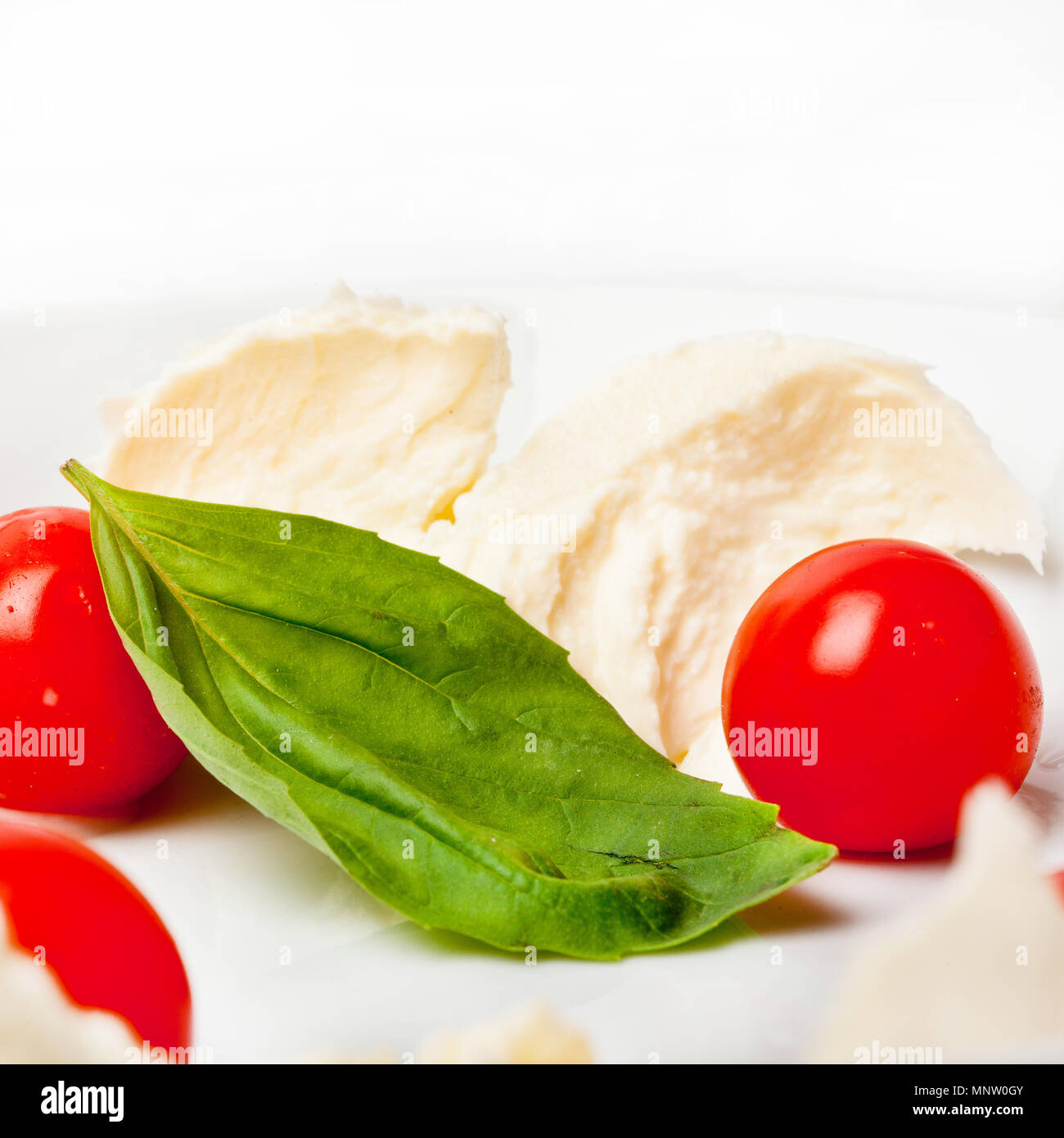 mozzarella tomato, close up, soccer, football with basil leaf and ...