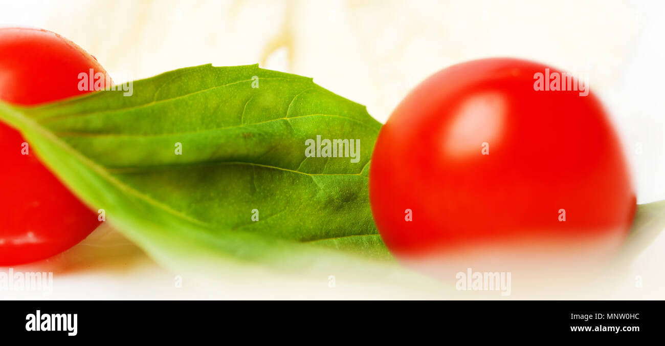 mozzarella tomato, close up, soccer, football with basil leaf and ...