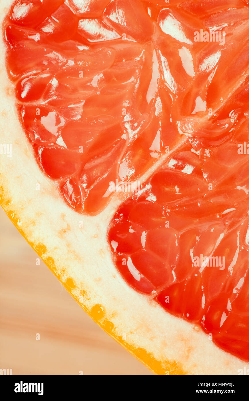 blood orange from above, half open on wooden background Stock Photo - Alamy
