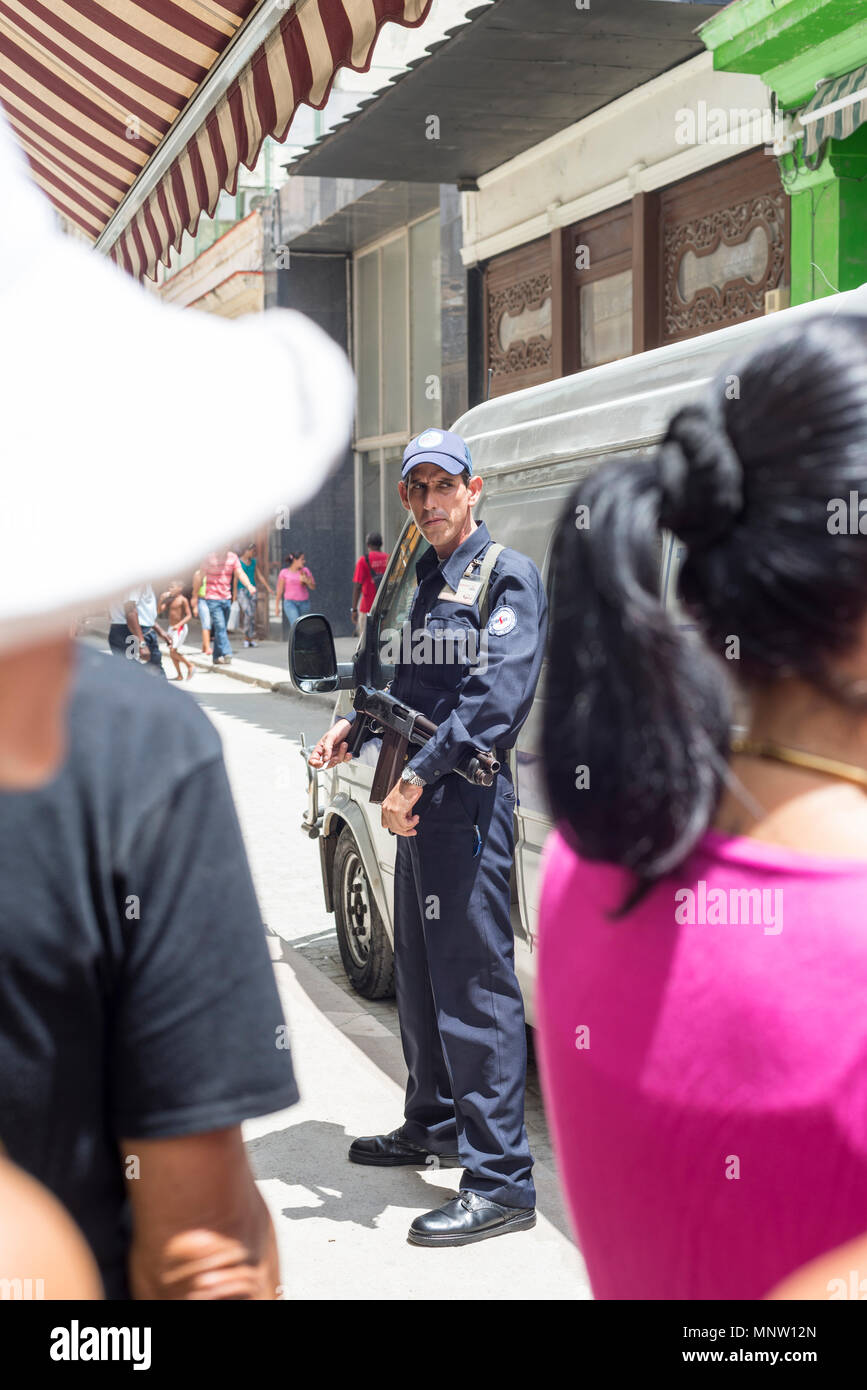 Security outside the bank in Old Town Havana Stock Photo - Alamy