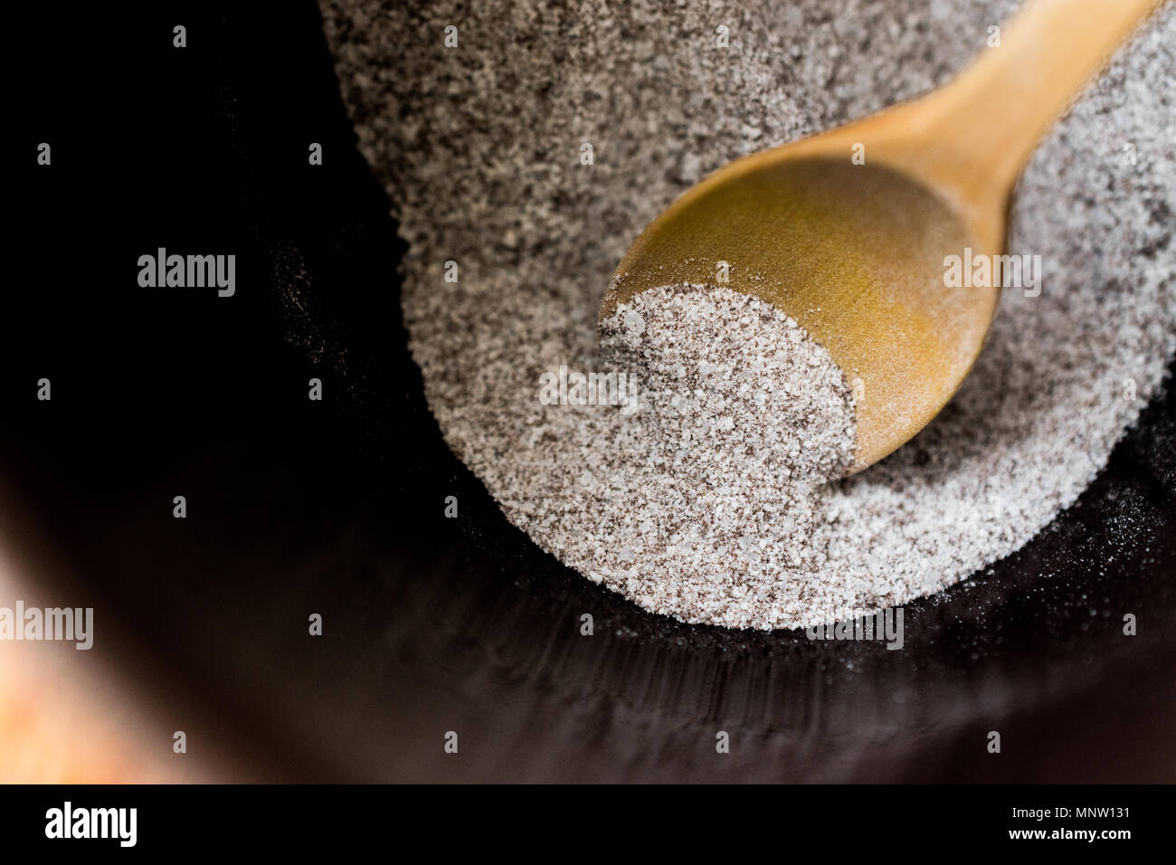 instant coffee powder 3 in 1; mixed with milk powder and sugar in a cup ...