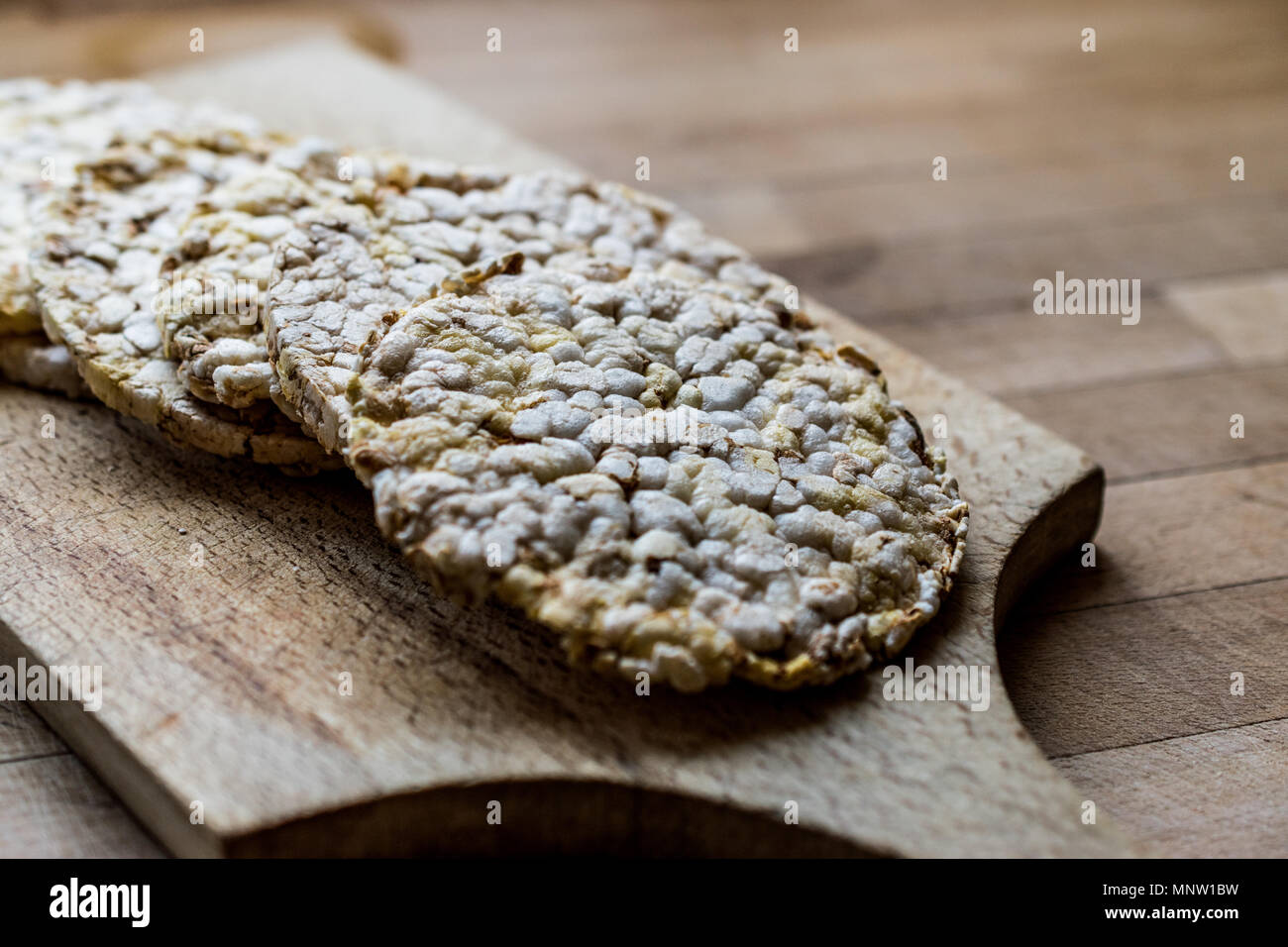 Rice Cakes or Corn Crackers on wooden surface. Appetizer Concept Stock ...