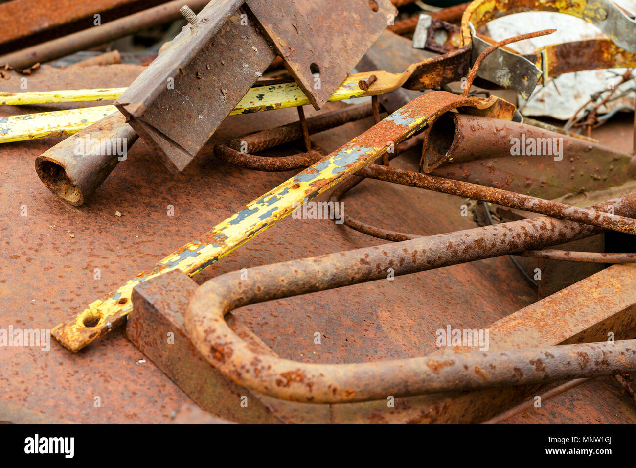 Pile of different old, rusted scrap metal. Close-up Stock Photo - Alamy