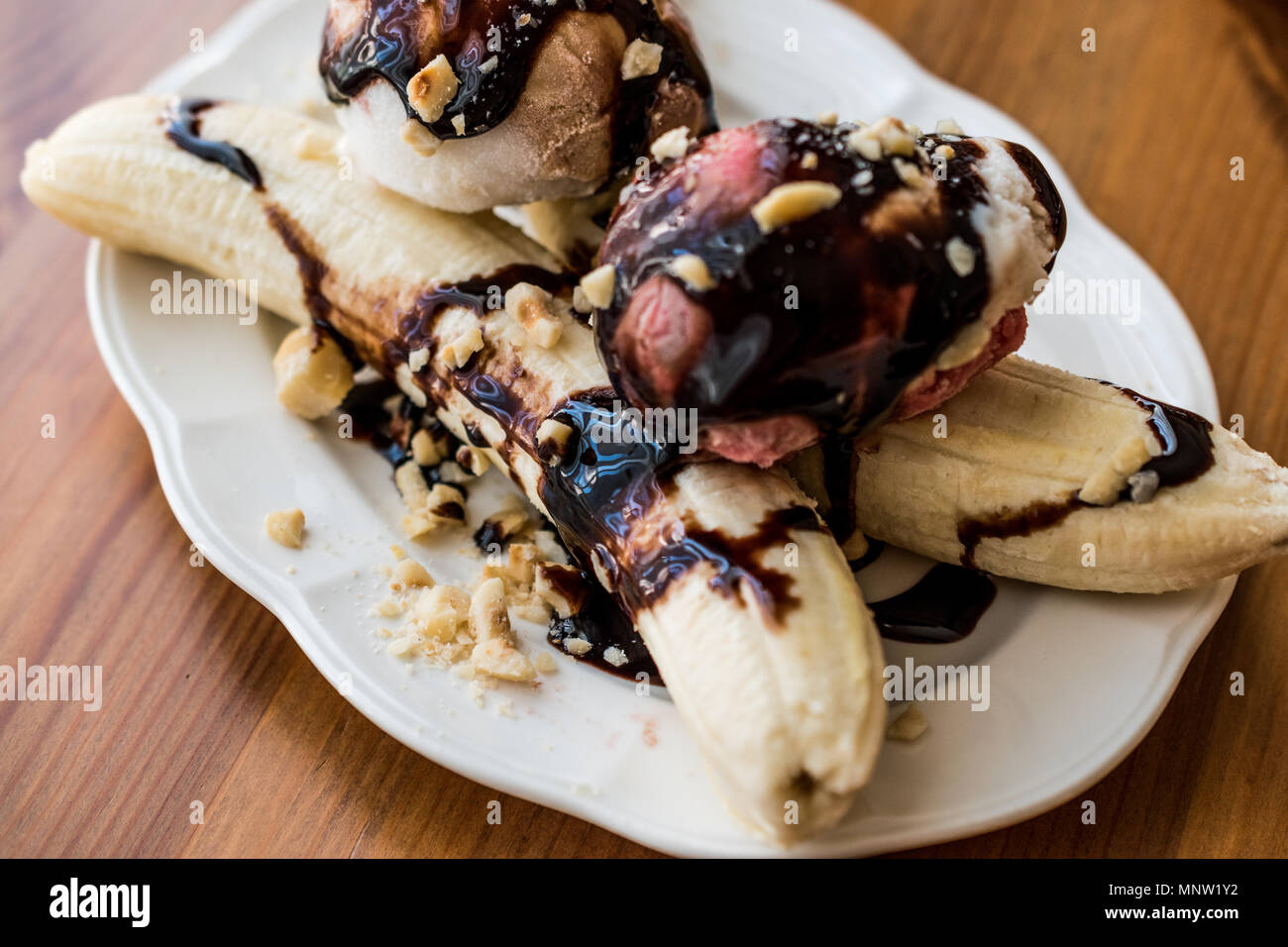 Banana Split with ice cream chocolate sauce and Hazelnuts. Dessert ...