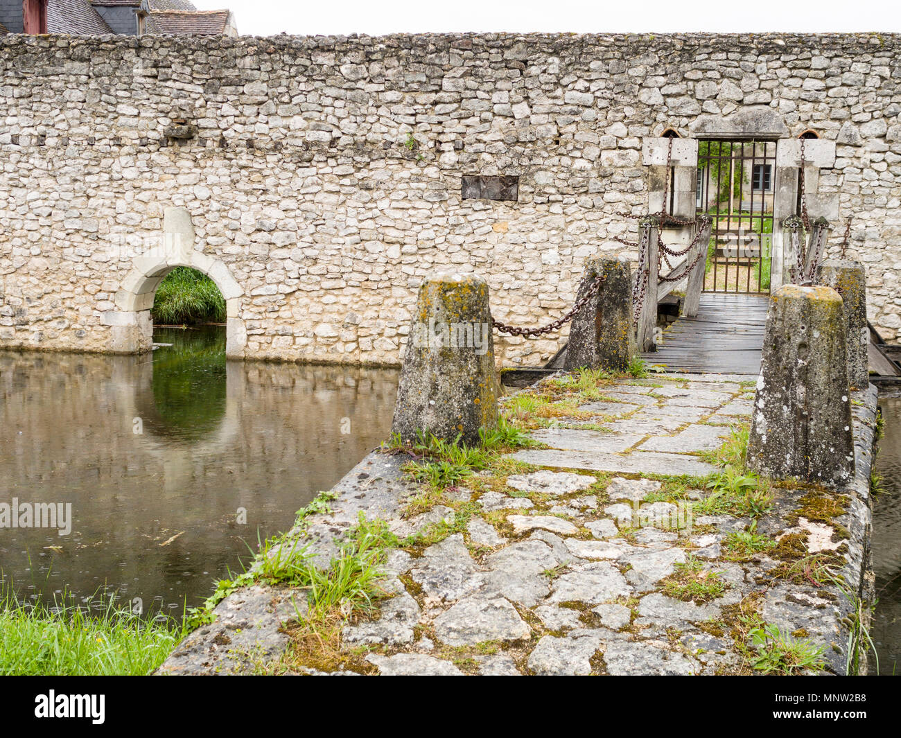 Rickety Bridge over the moat to Chemery: An old bridge with a stone ...