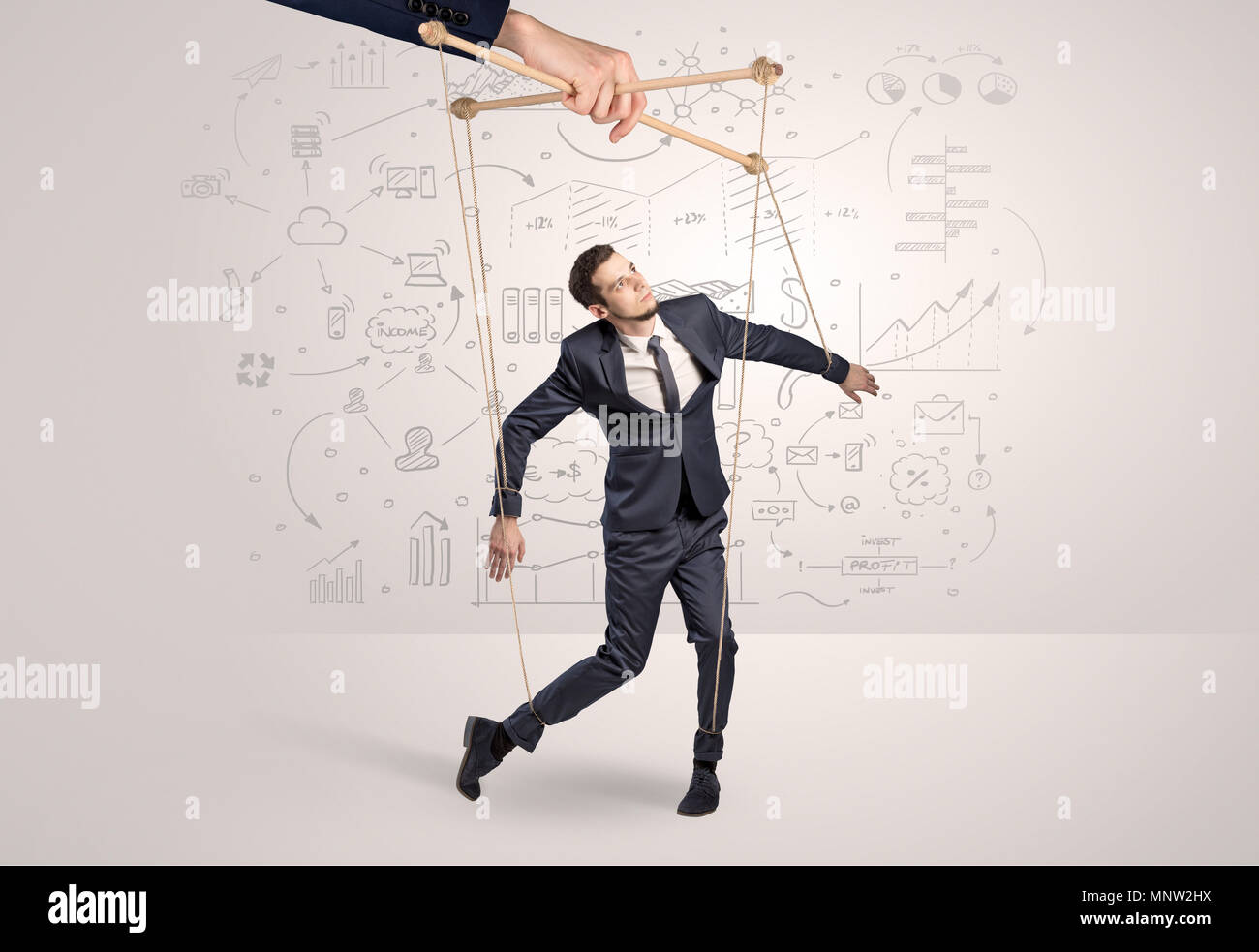 Little businessman controlled from above like a puppet concept Stock ...