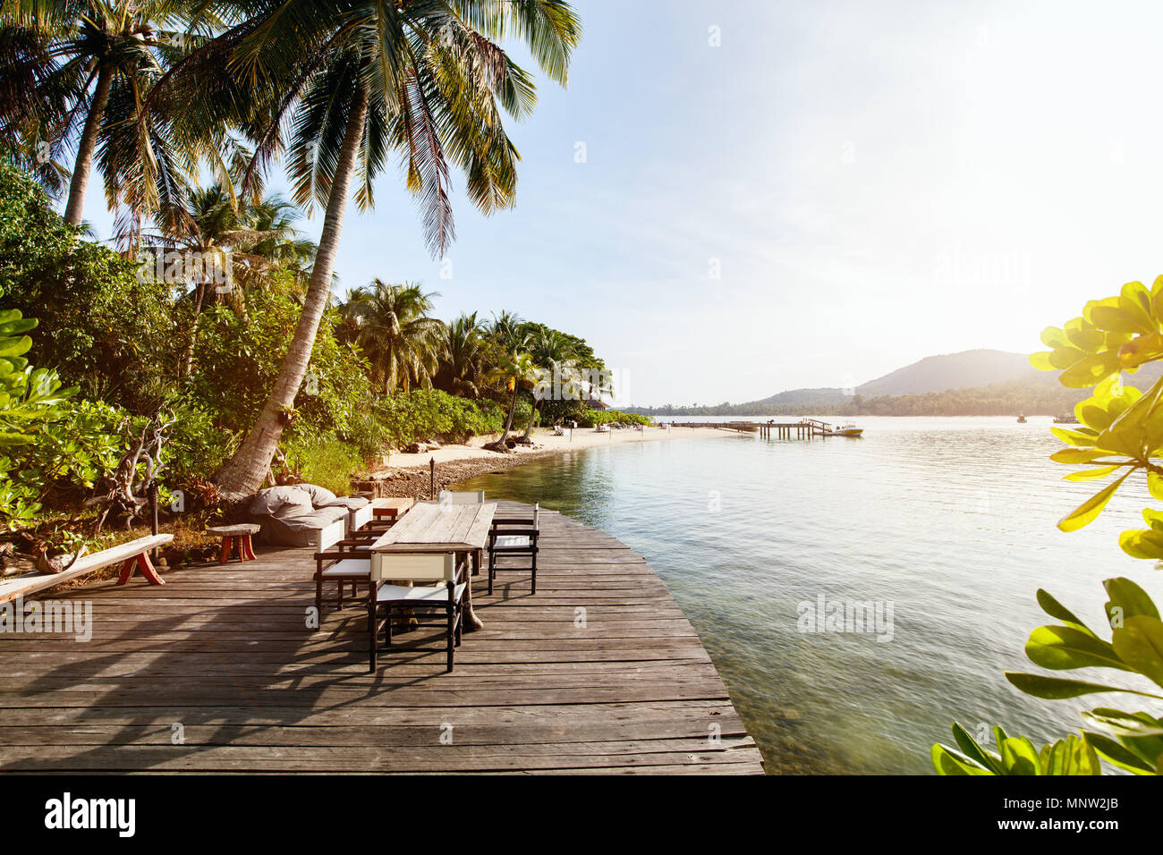 Romantic dinner setting at tropical resort on sunset Stock Photo - Alamy
