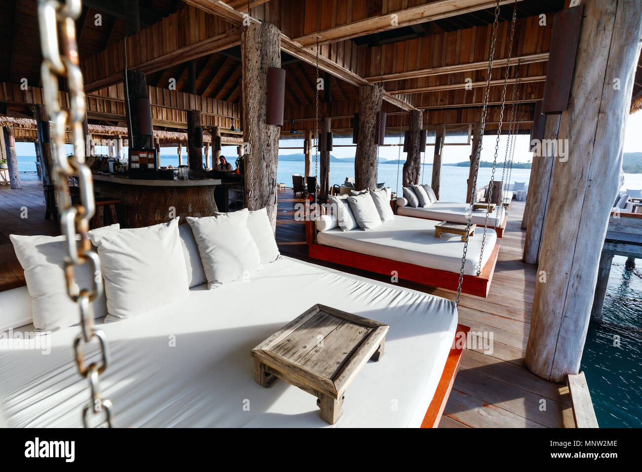 Interior of tropical overwater bar in a luxury resort Stock Photo - Alamy