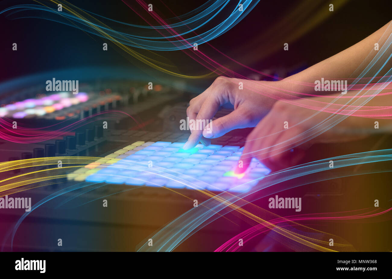 Hand mixing music on midi controller with colorful vibe concept Stock ...