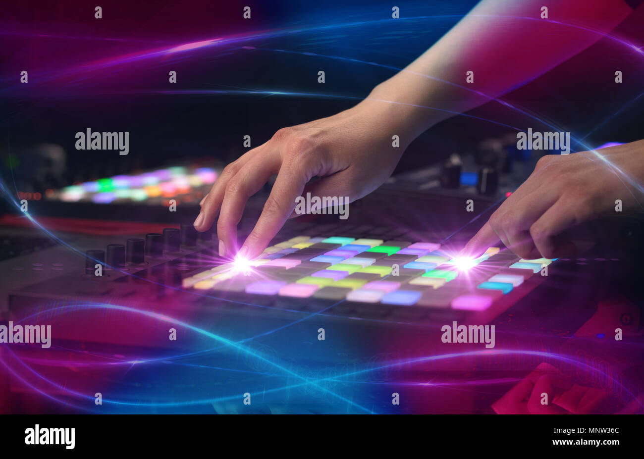 Hand mixing music on midi controller with wave vibe concept Stock Photo ...