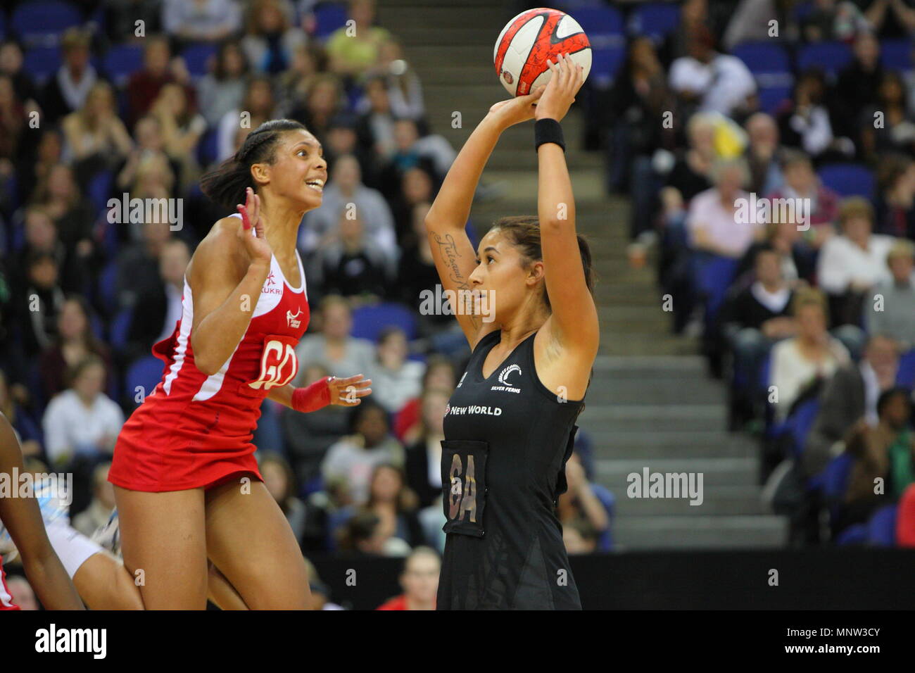Stacey Francis of England leaps to defend against Maria Tutaia during ...