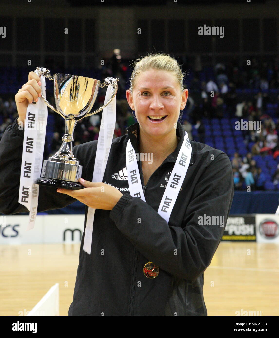 Casey Williams of New Zealand holds aloft the winners trophy during the ...