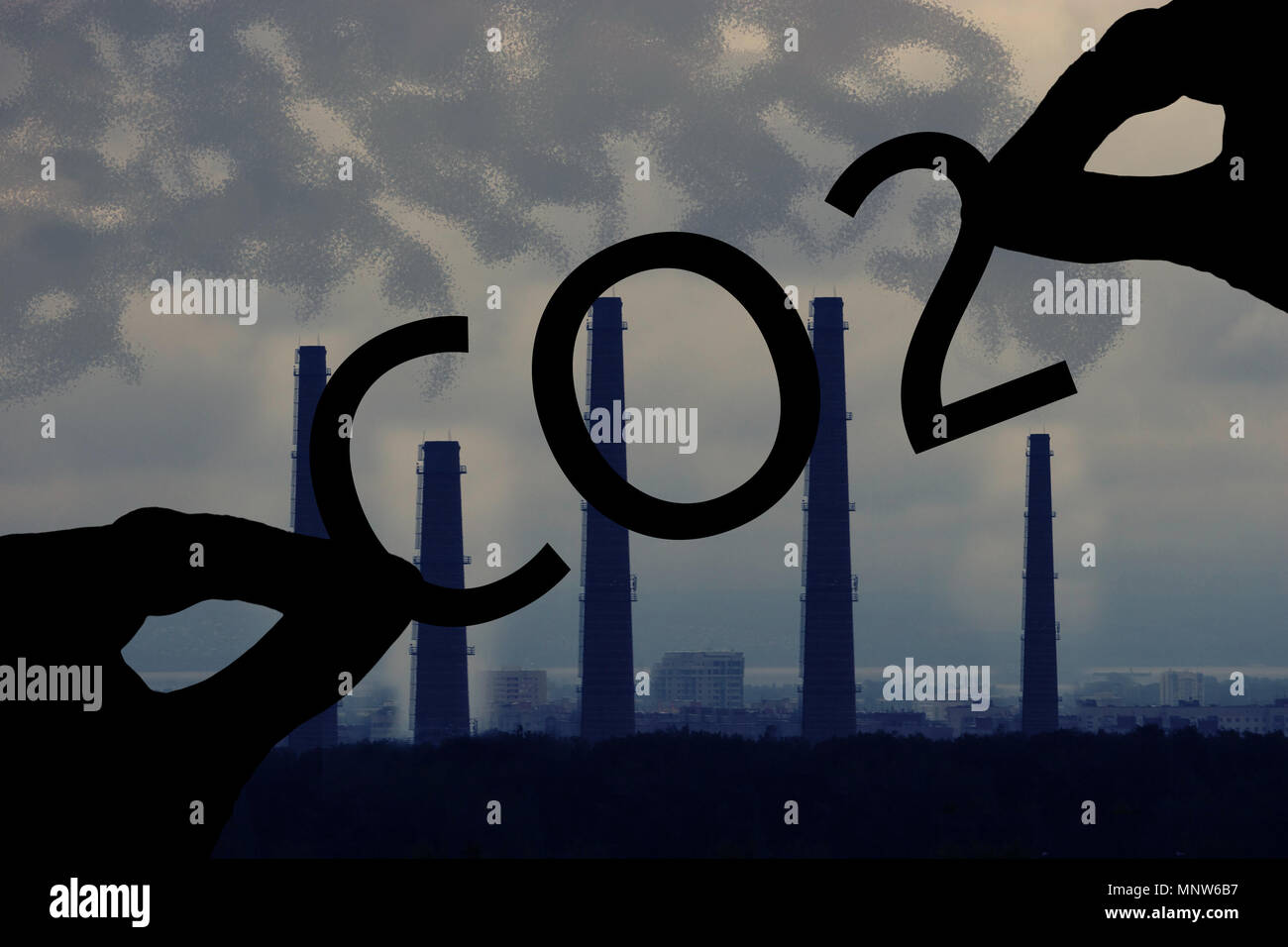 Smoke of chimney writing CO2 in the sky Stock Photo - Alamy