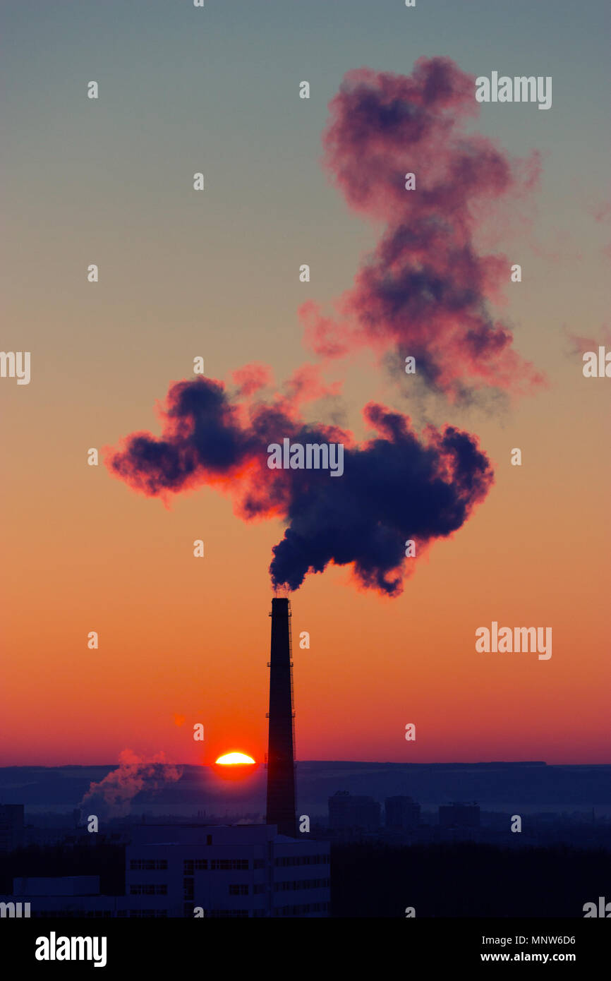 Smoke of chimney writing CO2 in the sky Stock Photo - Alamy
