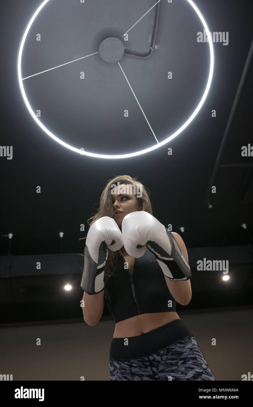 Beautiful young woman in boxing gloves Stock Photo - Alamy