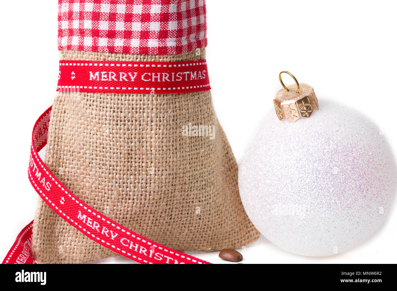 closed sack bag with red bow isolated on white background Stock Photo ...