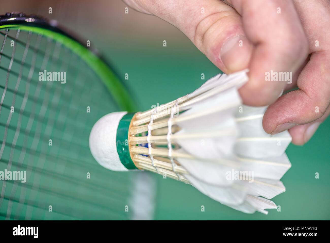 serve badminton with a shuttlecock Stock Photo - Alamy