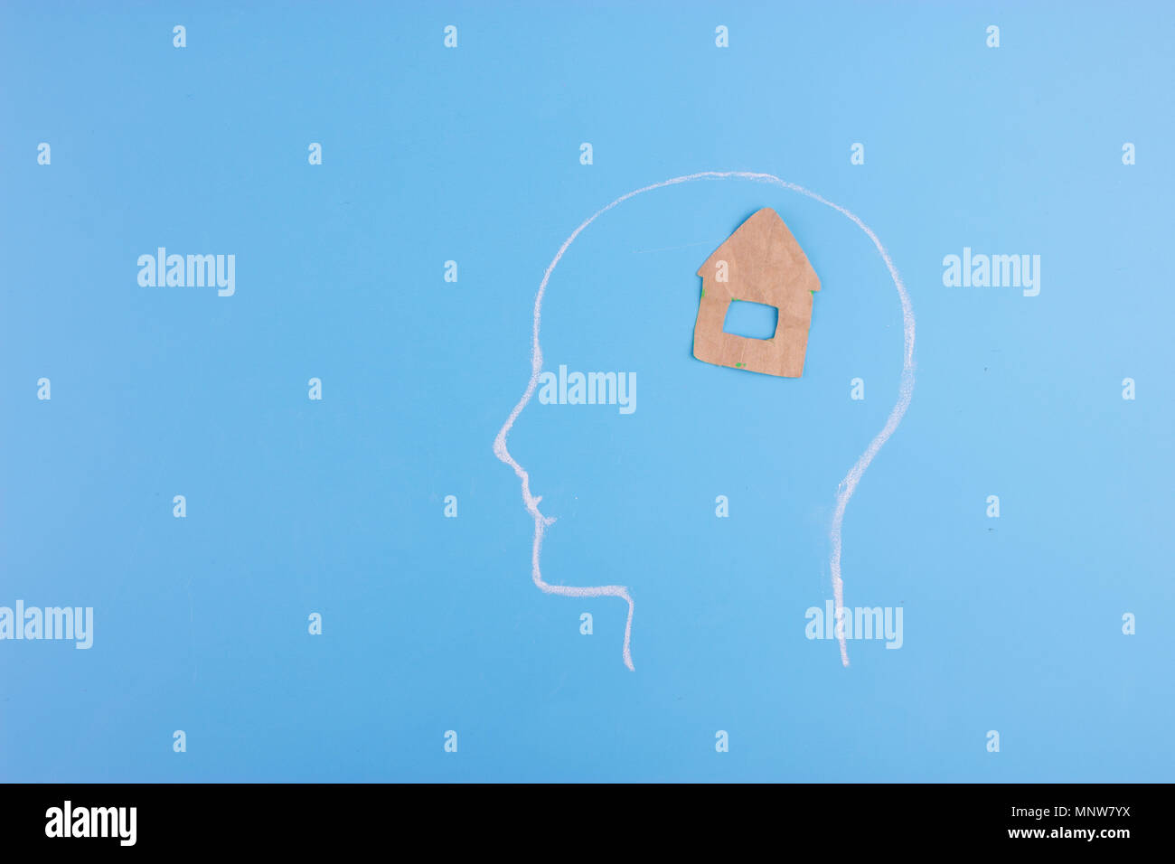 crayon sketched head silhouette on blue background Stock Photo - Alamy