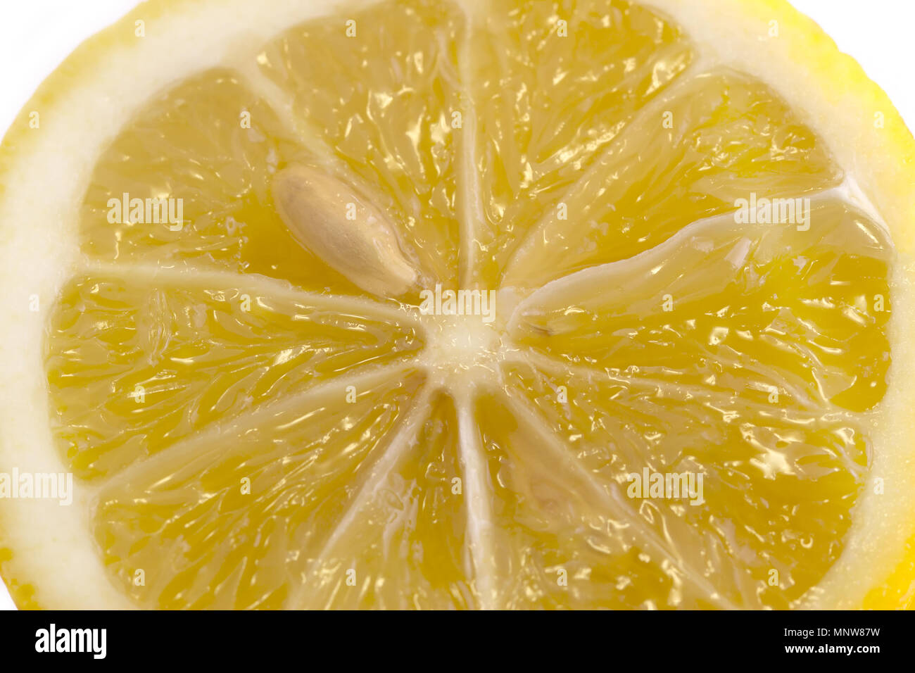 cut lemon yellow close-up on white background Stock Photo - Alamy